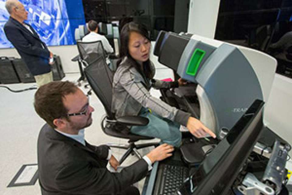 Young physicians take over controls to learn robotic surgery | UCLA Health